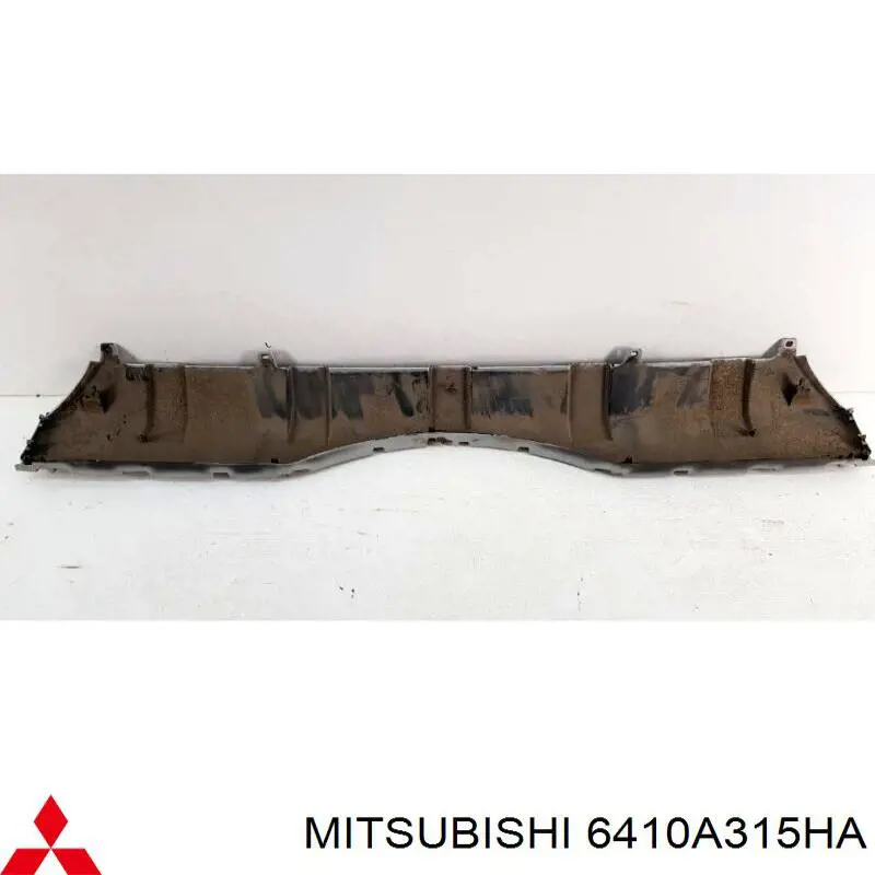 6410A579 Mitsubishi parachoques trasero, parte central