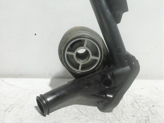 1405600Q0H Nissan brida del sistema de refrigeración (triple)